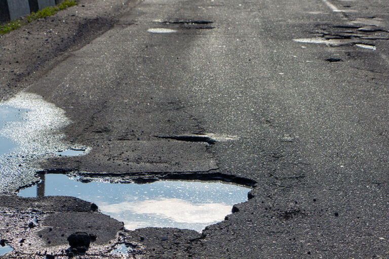 Pothole Damage Know The Warning Signs - Primary Care Auto Repair